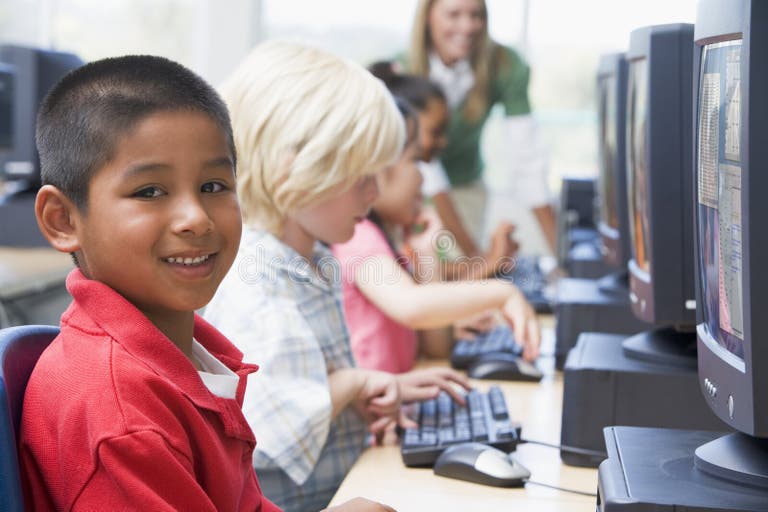 Kindergarten Children Learning To Use Computers Stock Photo - Image of ...