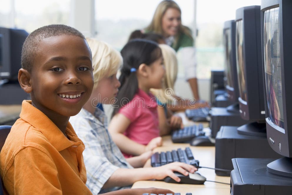 Kindergarten Children Learning To Use Computers Stock Image - Image of ...