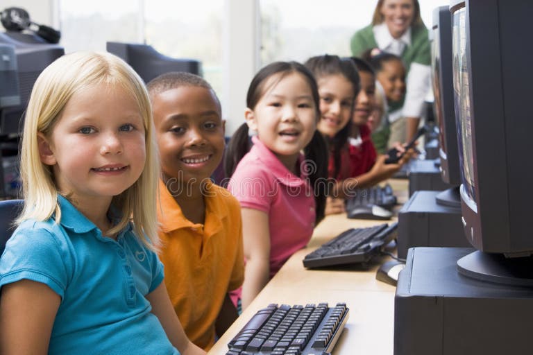 Kindergarten Children Learning To Use Computers Stock Image - Image of ...