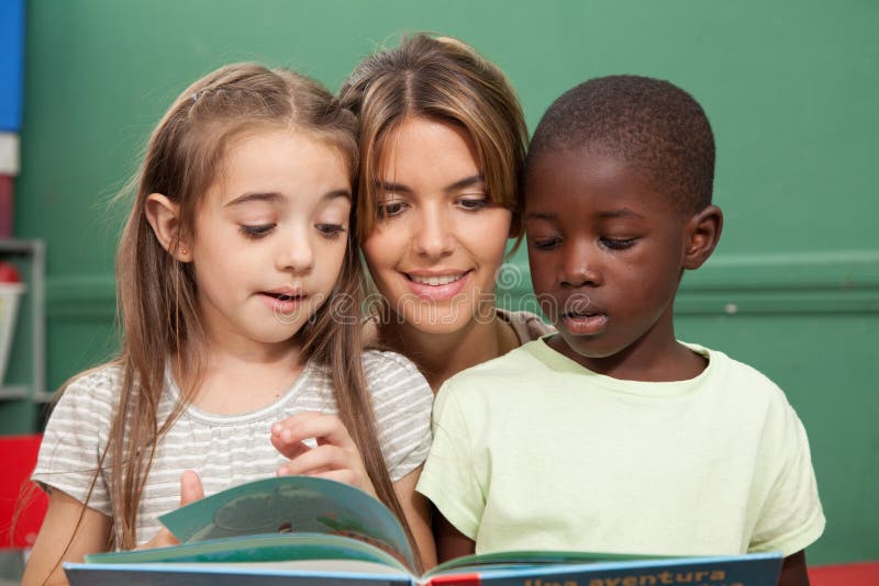 Kindergarten Class Reading a Book Stock Image - Image of pretty, black ...