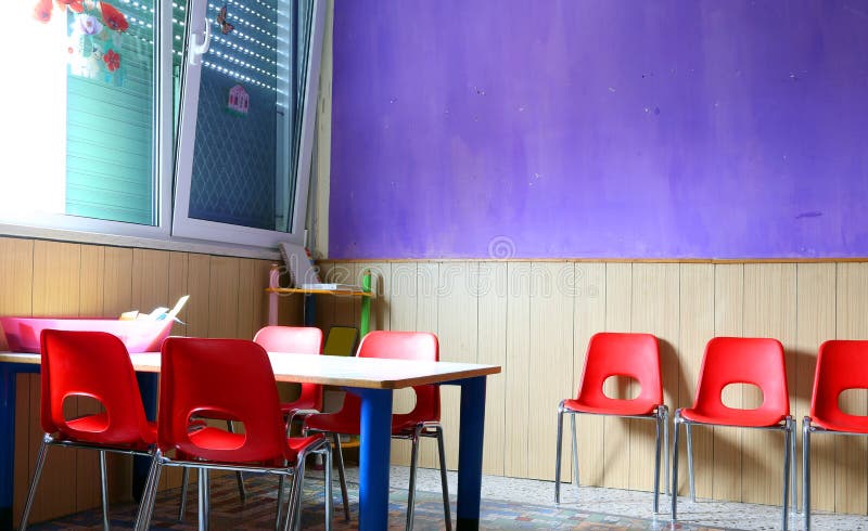 Kindergarten Classroom with Desks and Red Chairs without Kids Stock ...