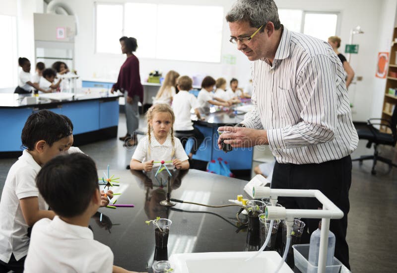 Kindergarten Students Learning Experiment in Class Stock Photo - Image ...
