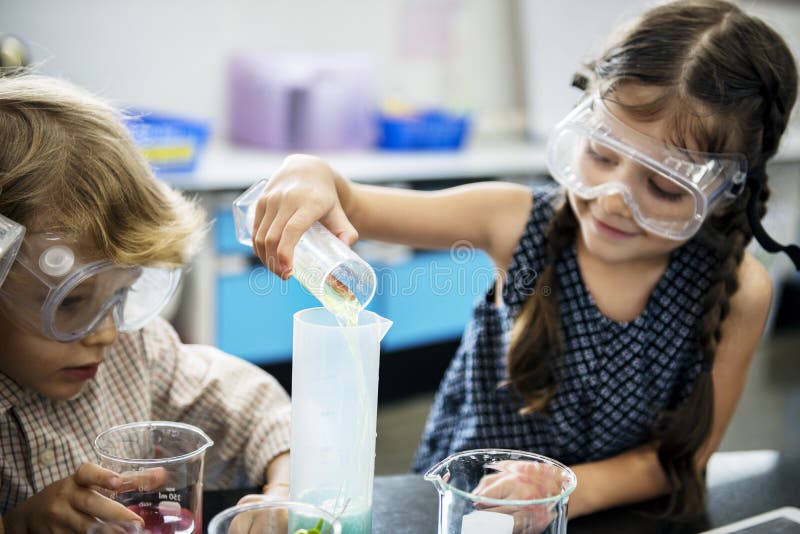 Students Mixing Solution in Science Experiment Class Stock Photo ...