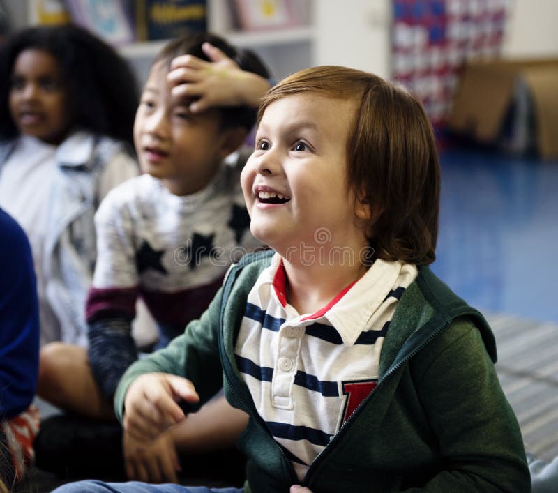 Kindergarten Students Sitting on the Floor Stock Image - Image of ...