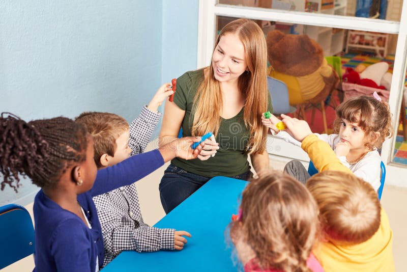 Kindergartner and Group of Children with Plasticine Stock Photo - Image ...