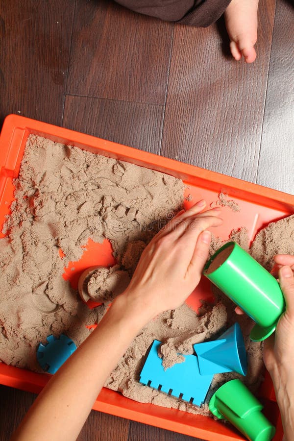 Kinetic sand play baby stock image. Image of developing - 65122161