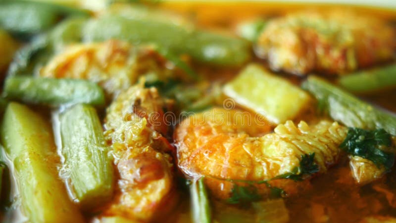 King Prawn Fish Curry in a Bowl on Table Stock Footage - Video of green ...