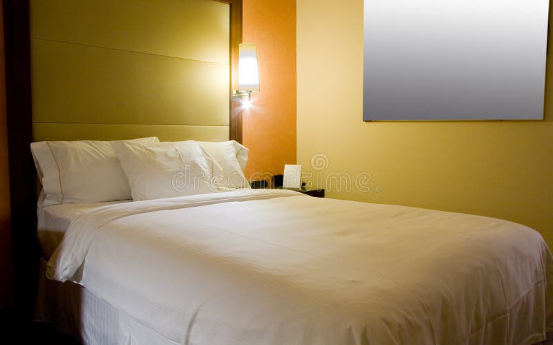 King-size Bed with Bedside Table and Lamp Stock Photo - Image of home ...