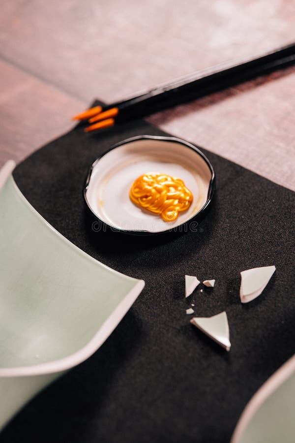 Kintsugi Concept. Gold Glue To Join Broken Ceramics Stock Photo - Image ...