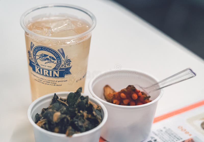 Kirin Draft Beer Served on Table with Japanese Snack Editorial Image ...