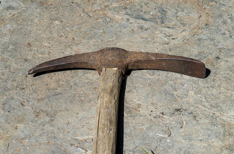 The Pickaxe Tool Lies on the Stone. Extraction of Stone or Gold Iron ...