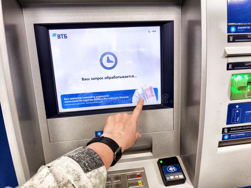 Kirov, Russia - September 18, 2024: Customer Using an ATM for Banking ...