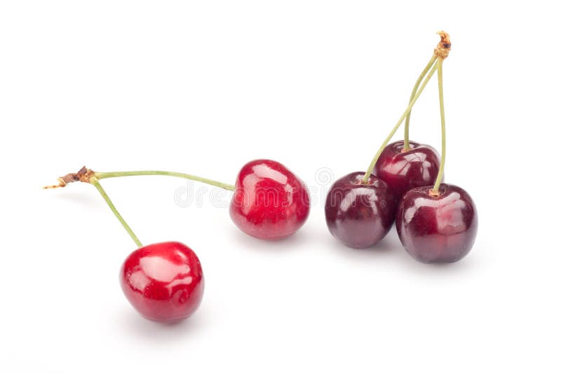 3 Süße Kirschen Und Hälfte Lokalisiert Auf Weißem Hintergrund Stockfoto ...