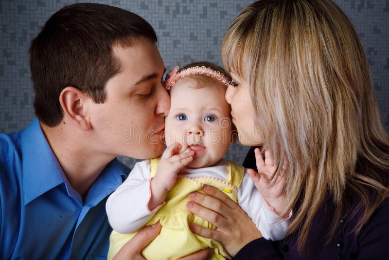 Kiss of parents stock photo. Image of family, parent - 10473868