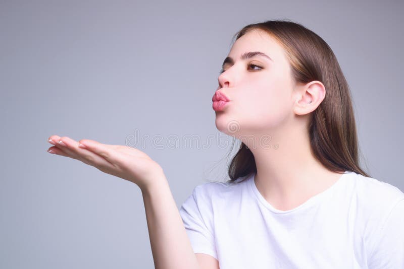 Kiss Portrait Of Cute Lovely Girl Sending Blowing Kiss With Pout Lips