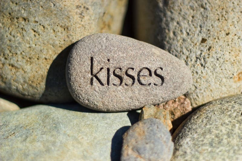 Kisses Message Carved on a Rock Stock Photo - Image of rocks, carved ...