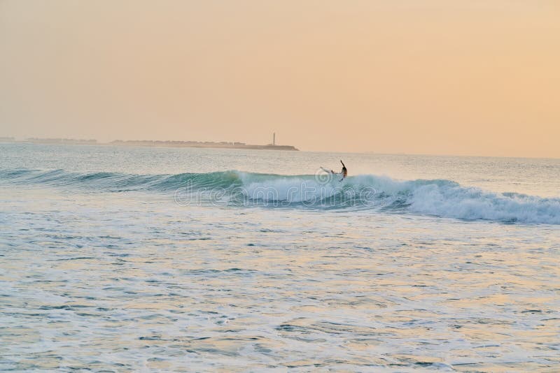 Kit surfing on the beach stock image. Image of surfing - 344906291