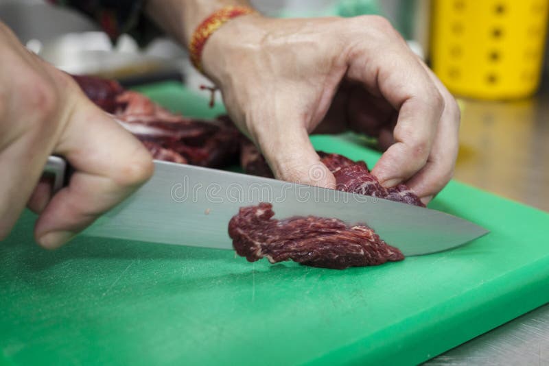 Kitchen Cutting Actions with Knife, Avocado and Hands. Stock Photo ...