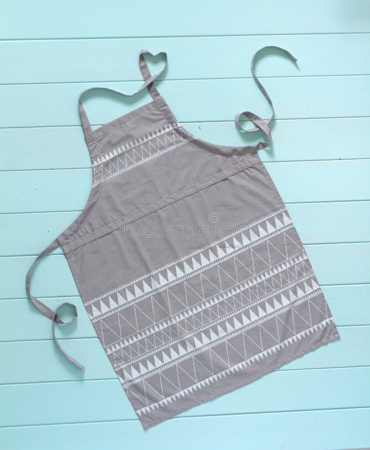 Kitchen Apron of Gray Color on Turquoise Background Stock Photo - Image ...