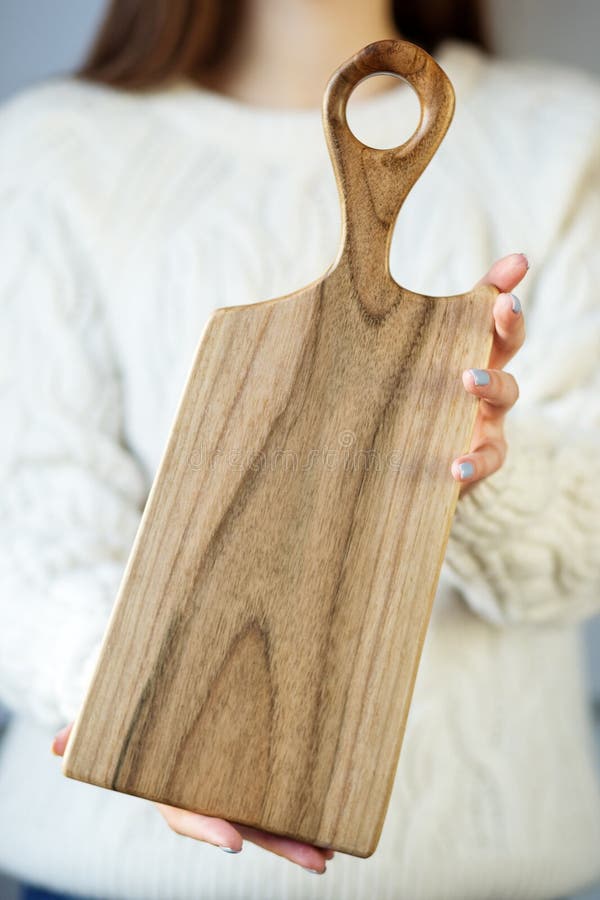 Kitchen Board in Female Hands. the Concept of Food, Cooking Stock Photo ...