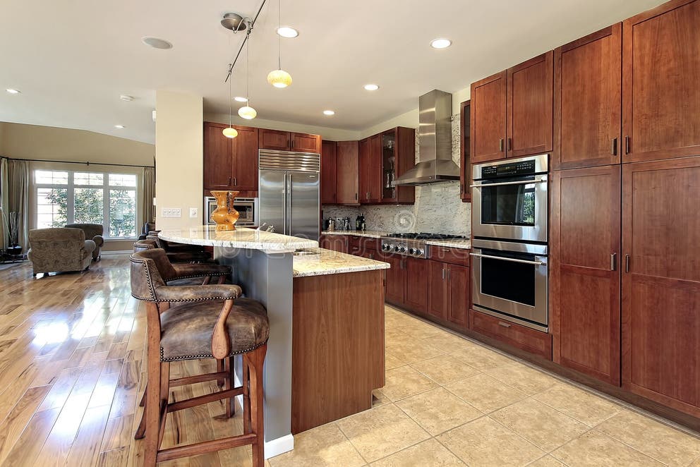 Kitchen with breakfast bar stock image. Image of counter - 12656929