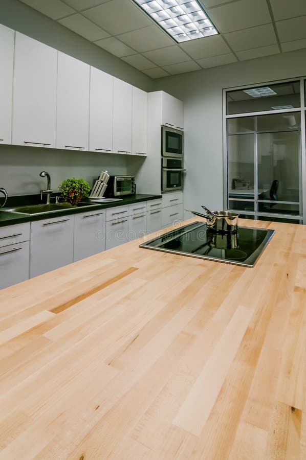 Kitchen Butcher Table Island with Stove Top and Pans Stock Image ...