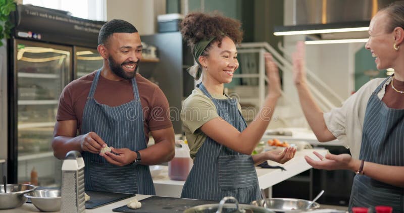 Kitchen, Chef and High Five for Cooking in Restaurant with Food ...