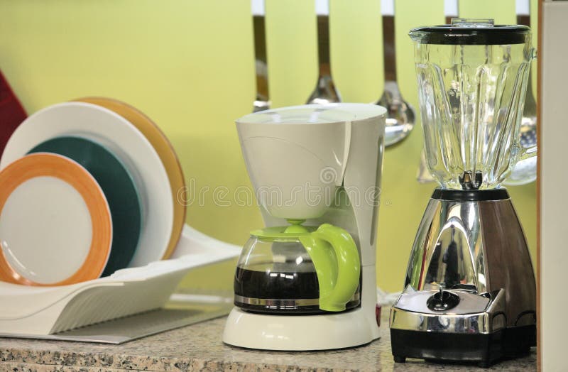 Kitchen with Coffee Maker and Fruit Press Stock Photo - Image of ...