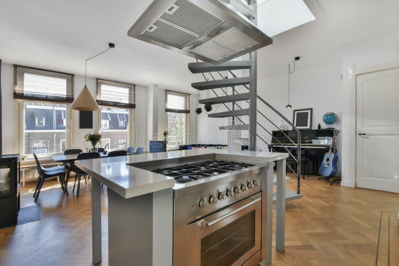 Kitchen Combined with Living Area Stock Image - Image of windows, light ...