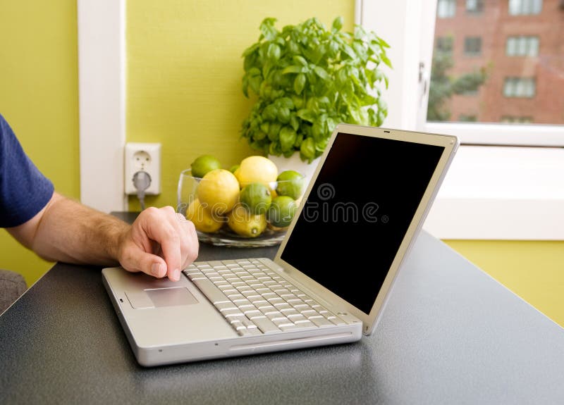 Laptop Computer on Kitchen. Stock Photo - Image of ethnic, indoors: 2044974