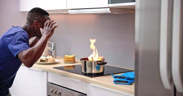 Kitchen Cooking Mistake and Fire Disaster Stock Image - Image of ...