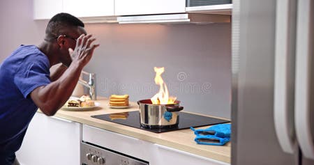 Kitchen Cooking Mistake and Fire Disaster Stock Image - Image of ...