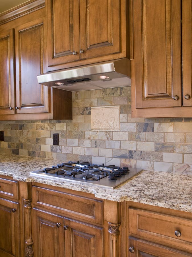 Kitchen Cooktop and Cabinets Angle View Stock Photo - Image of room ...