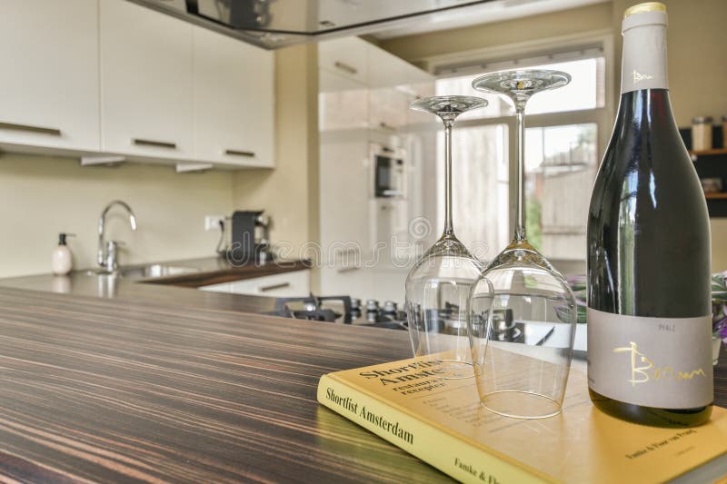 A Kitchen Counter with a Bottle of Wine and Glasses Editorial Image ...