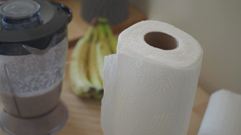 A Kitchen Counter Featuring a Paper Towel Roll Alongside Various ...