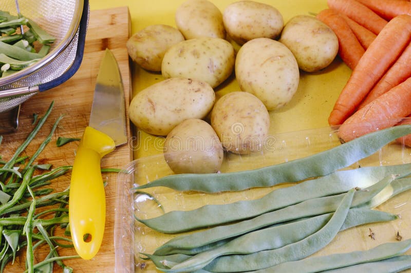 Kitchen Counter Full of Vegetables because they are Cooking Stock Photo ...