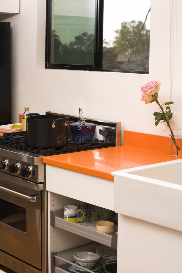 Kitchen counter and stove stock image. Image of cooking - 4586821