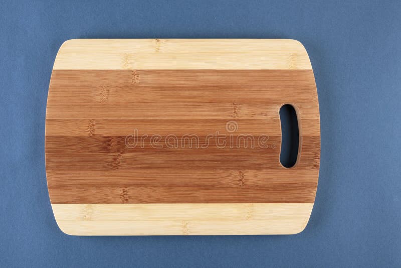Kitchen Cutting Board on a Blue Stock Photo - Image of equipment, table ...