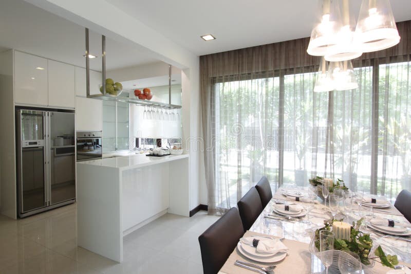 Kitchen and dining area stock image. Image of chairs - 14755115