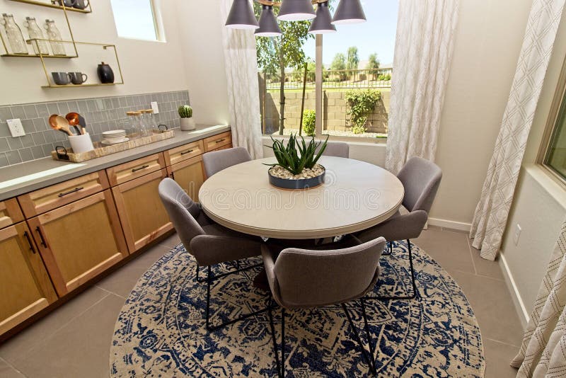 Round Kitchen Area Table with Five Chairs Stock Image - Image of indoor ...