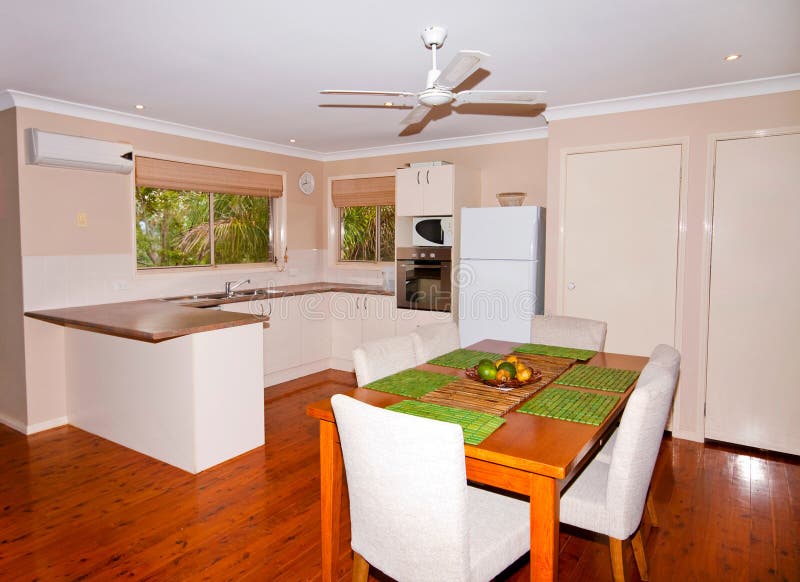 Kitchen and Dining Rooms stock image. Image of cook, residence - 12864463