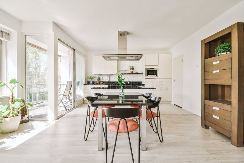 Kitchen and Dining Zone in Studio Apartment Stock Photo - Image of ...