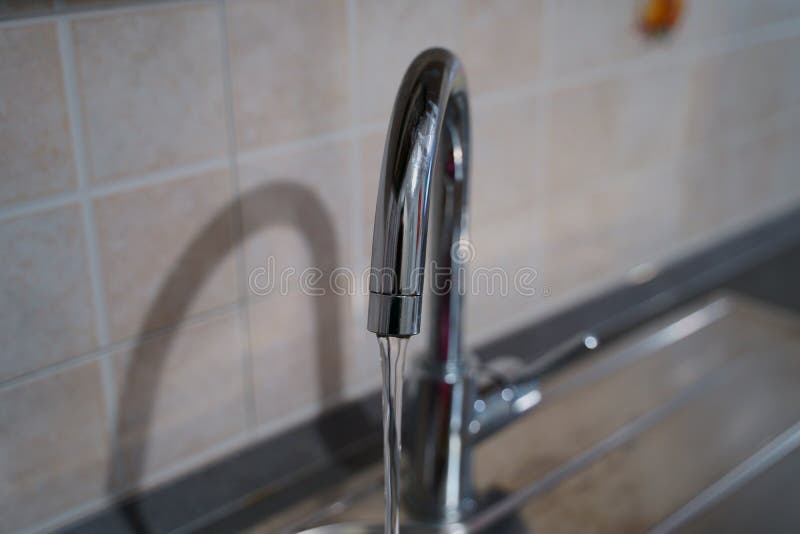 Tap with running water stock photo. Image of kitchen - 168285136