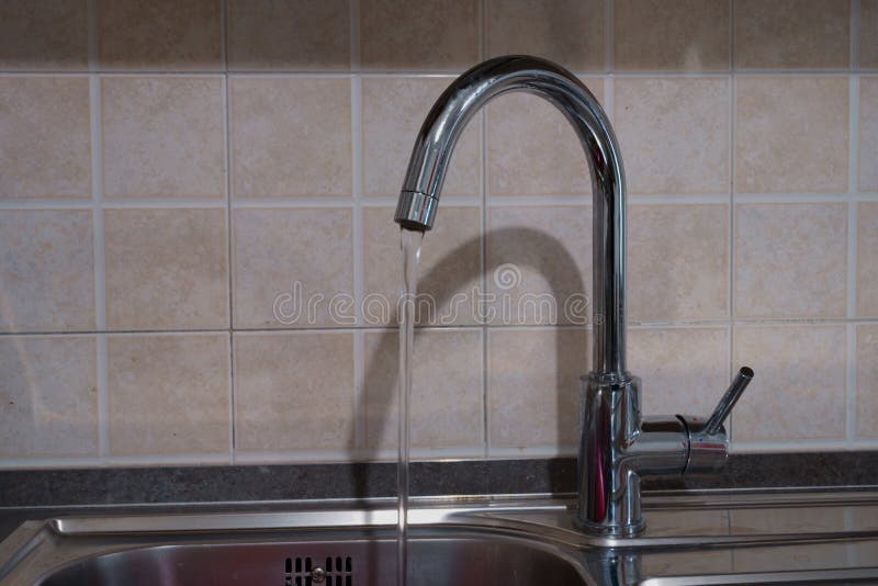 Tap with running water stock image. Image of faucet - 168285393