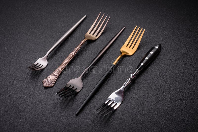 Kitchen Fork Made of Steel on a Dark Textured Background Stock Image ...