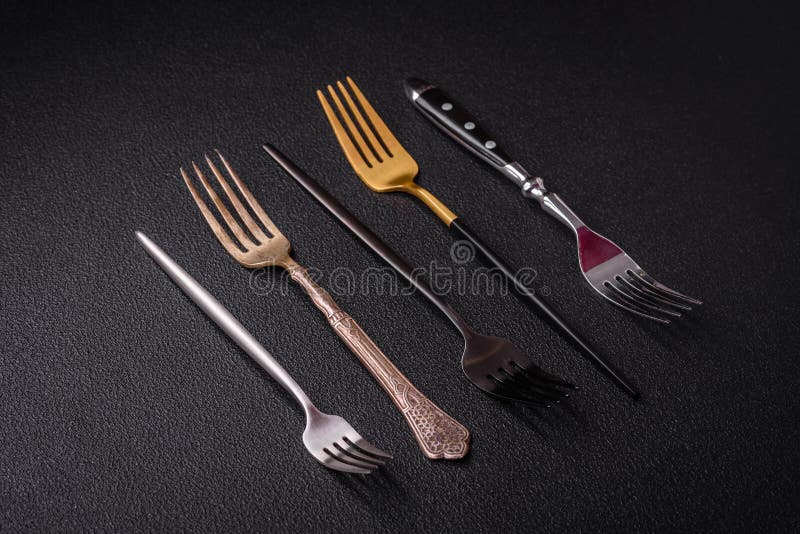 Kitchen Fork Made of Steel on a Dark Textured Background Stock Photo ...