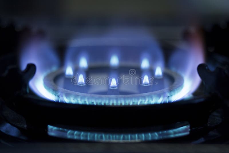 Kitchen Gas Stove in a Kitchen Burning Gas. Stock Photo - Image of ...