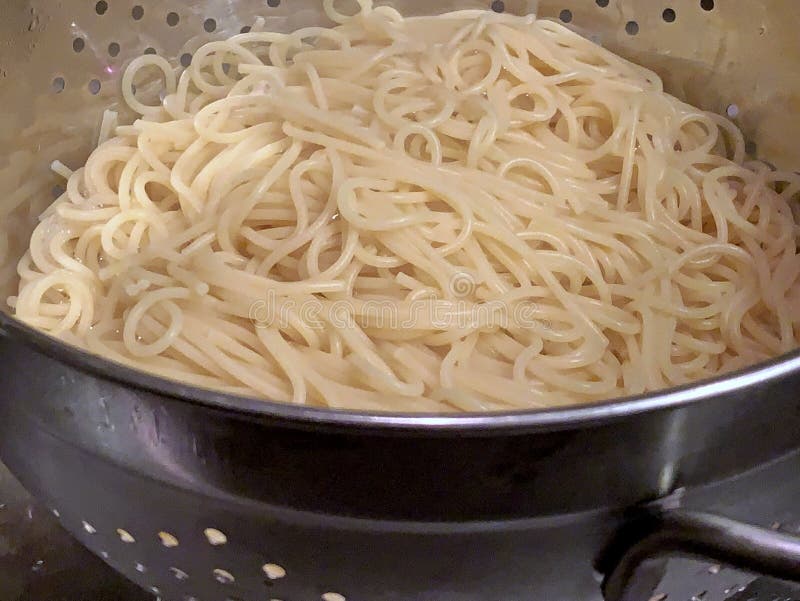 Colander of Steaming Hot Spaghetti Draining Stock Image - Image of ...