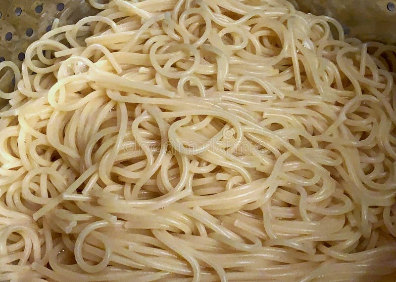 Colander of Steaming Hot Spaghetti Draining Stock Image - Image of ...