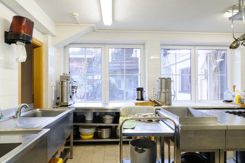 Utensils on Counter in Commercial Kitchen Stock Photo - Image of ...